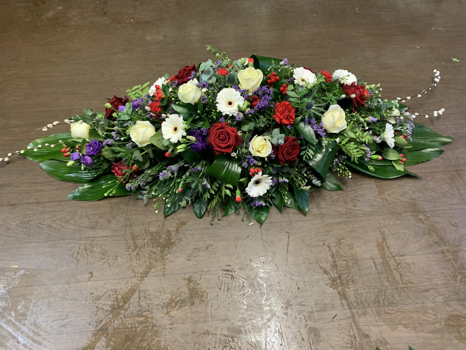 Rose and Lily Coffin Spray | Showers of Flowers