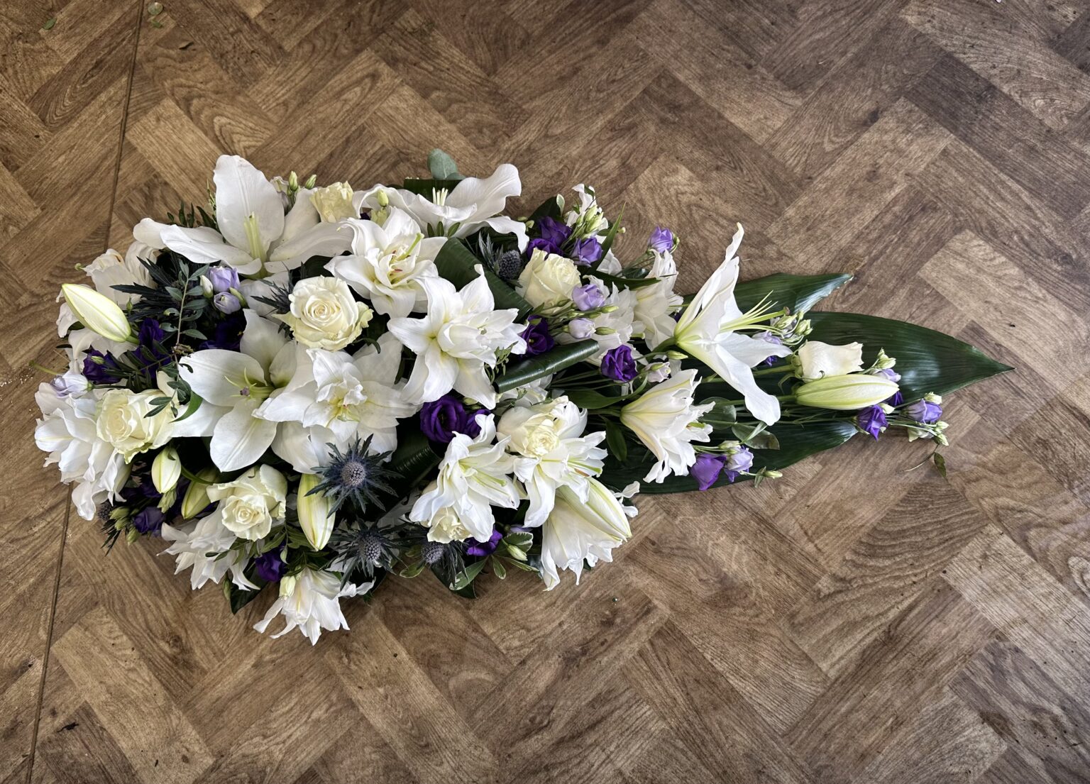 Rose and Lily Coffin Spray | Showers of Flowers